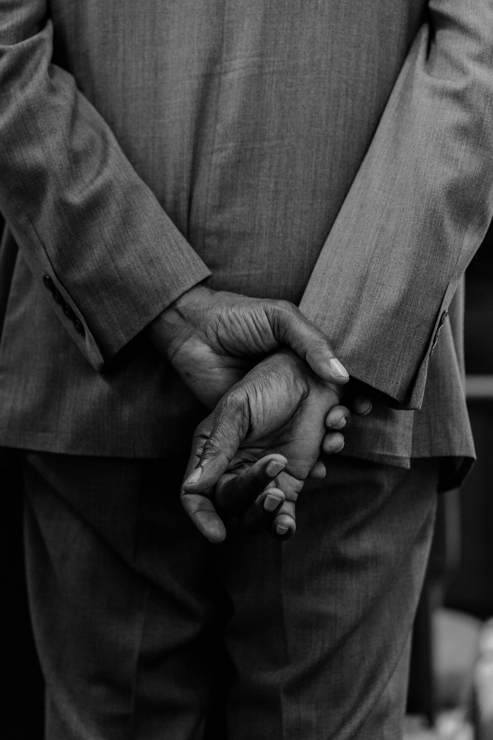 Decoding the Meaning of Standing with Hands Behind the Back - Owlcation